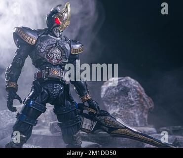 A closeup shot of SIC Kamen Rider Blade Ace Form figure on dark background filled with smoke ...