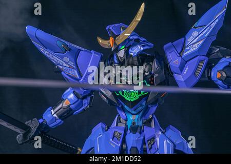 A closeup of Moshow Progenitor Effect Masamune Date figure on dark ...