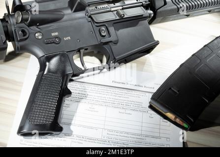 FBI NICS check form in public domain with an assault rifle and pen ...