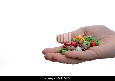 handful crumpled colorful paper on a white background Stock Photo - Alamy