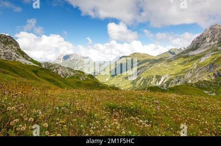 View from the Gehrengrat over the foggy peaks of the Alps. Lech ...