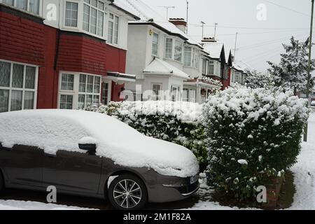 A snow-covered cars in Greenway Gardens, Barnet, Colindale, London ...