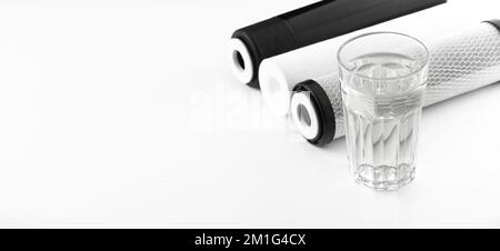Banner of three of cartridges for water filter with clear fresh glass ...