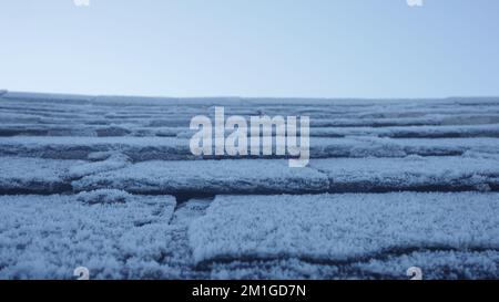 A Liscannor stone roof covered in a heavy layer of frost Stock Photo ...