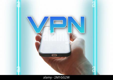 hand holding a smart phone with vpn icon Stock Photo - Alamy
