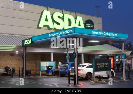 Asda supermarket assistant is shopping for online shopper for click and ...