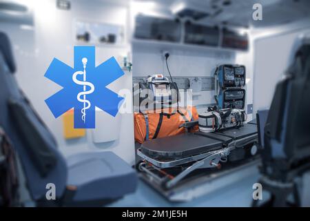 Interior of an ambulance with bed and patient care equipment ...