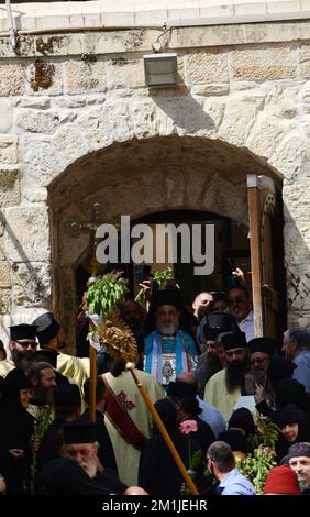 Greek Orthodox priests and nuns walking in a procession from the Tomb ...