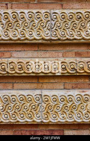 Close-up detail of new brick house top with two narrow plastic attic ...