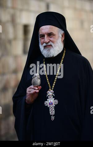 priest of the eastern orthodox church during a religious ceremony ...