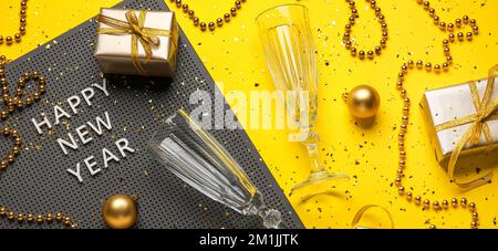 Gift boxes with Christmas balls and glitters on blue background Stock ...