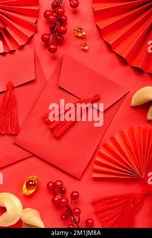 Fortune cookies with red envelopes and Chinese symbols on grunge ...