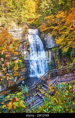 Huge waterfall over cliffs surrounded by fall foliage in New York Stock ...