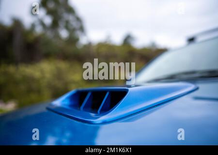 car bonnet on a truck with a turbo blue Stock Photo - Alamy