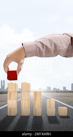 Wooden blocks with symbol of economic crash concept on blue background ...