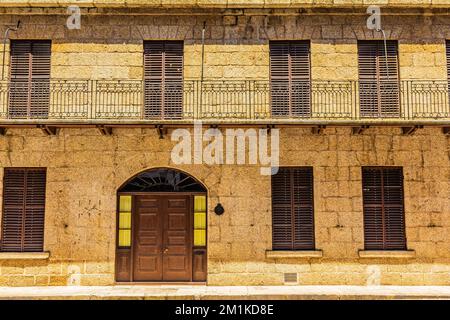 Old stone facade faced historic building in Cape Town city Stock Photo ...