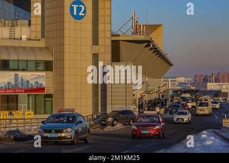 Cars passed by the T2 terminal of Urumqi Diwopu International Airport ...