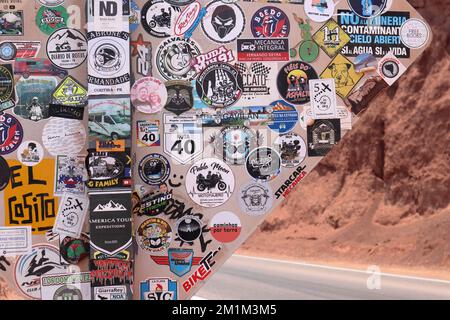 Road sign full of stickers of travelers on the side of route 68 in ...