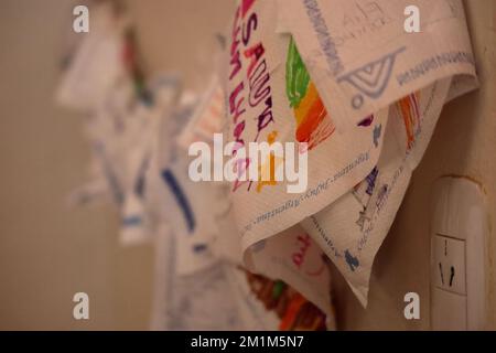 Clothesline with hanging messages inside a bar in argentina Stock Photo ...
