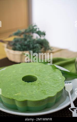 Indonesian Food, Puding Pandan Lumut in a white bowl decorated with ...