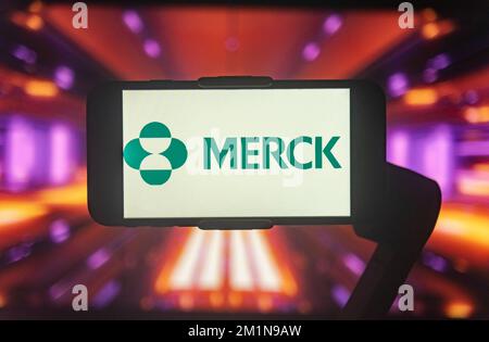 In this photo illustration, a MERCK logo is seen displayed on a ...
