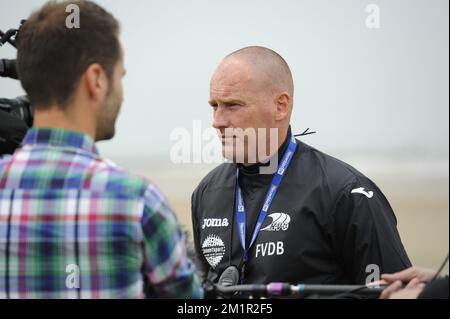 Oostende's head coach Frederik Van Der Biest (C) and his players ...