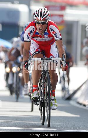 Russian Alexander Kolobnev of Team Katusha celebrates as he crosses the ...