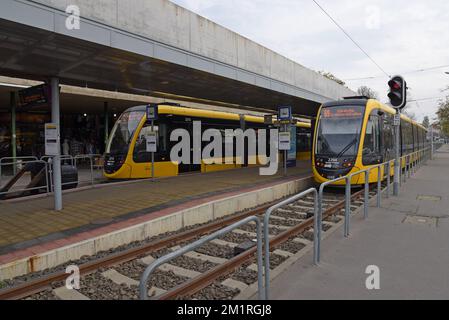 Budapest CAF Urbos trams at Mexikói út Metro station and tram stop ...