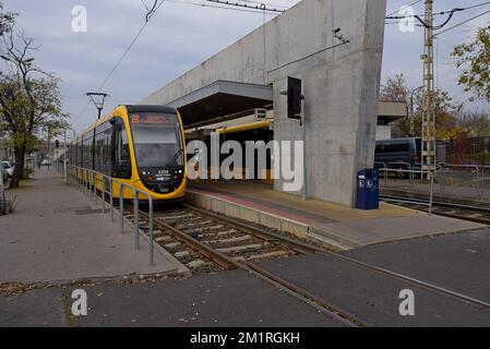 Budapest CAF Urbos trams at Mexikói út Metro station and tram stop ...