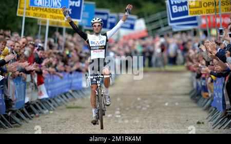 Belgian Niels Albert celebrates as he crosses the finish line to win ...
