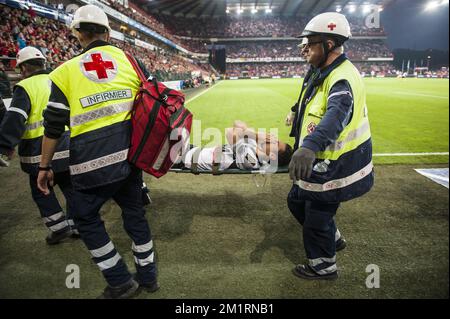 Lokeren's player is injured during the Jupiler Pro League match between ...