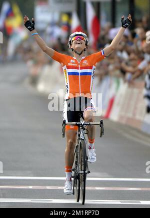 Dutch Marianne Vos celebrates as she wins the women elite race of the ...