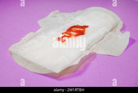 menstrual intimate pad with authentic blood from period with purple ...