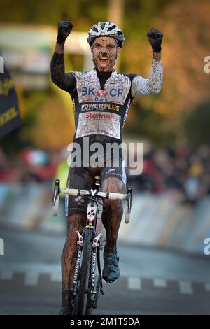 20131110 - HAMME, BELGIUM: Belgian Niels Albert celebrates as he ...