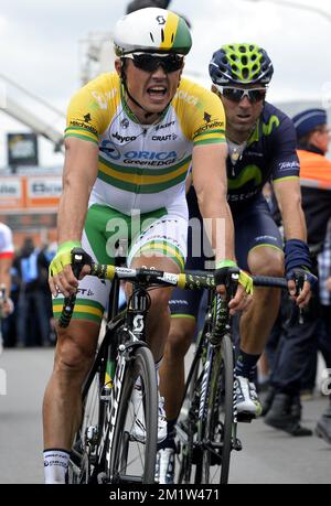 Winner Australian Simon Gerrans of Orica GreenEDGE celebrates with the ...