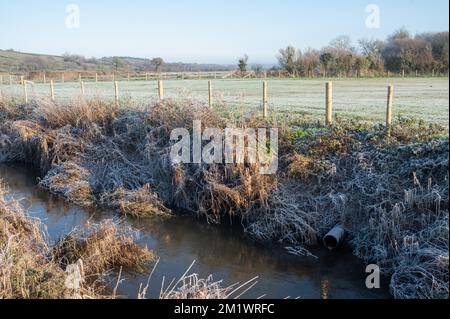 Field drainage pipe discharging into Gwendraeth Fach river ...