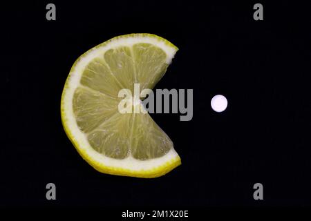lemon wedge that simulates the famous video game Stock Photo - Alamy