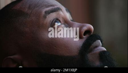 African man seeking God help. Person looking at sky wanting FAITH and ...