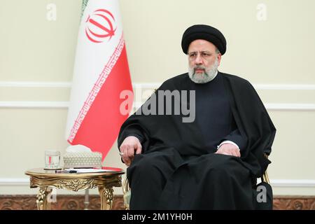 Iranian President Ebrahim Raisi (R) meets Russian State Duma ...