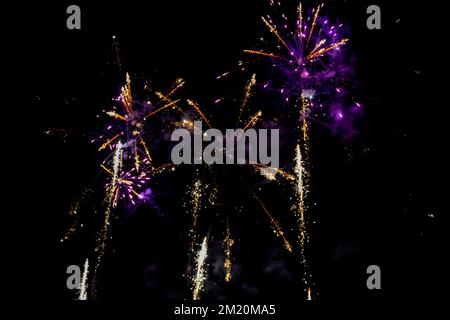 Fireworks ,Gold and purple lights Stock Photo - Alamy