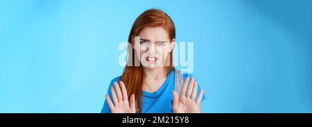 Close-up uninterested displeased ignorant picky redhead girlfriend ...