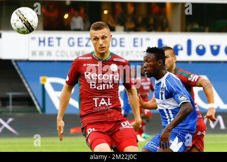 Essevee's Timothy Derijck and Eupen's Mamadou Sylla fight for the ball ...