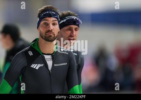 CALGARY, CANADA - DECEMBER 13: Kjeld Nuis of Team Reggeborgh, coach Gerard van Velde of Team ...