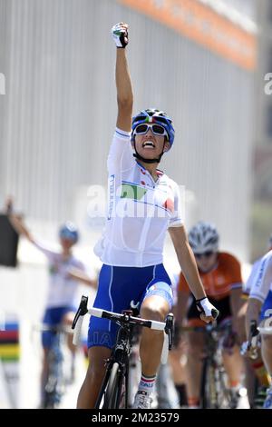 Italian Elisa Balsamo celebrates as she crosses the finish line to win ...