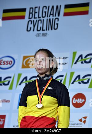 Belgian Tess Van Loy celebrates as she crosses the finish line at the ...