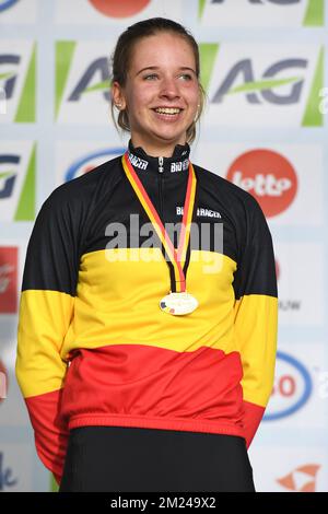 Belgian Tess Van Loy celebrates as she crosses the finish line at the ...