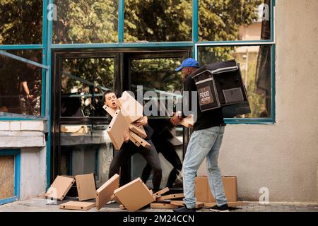 Reckless delivery worker dropping pizza boxes, scared courier running ...