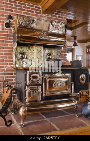 Antique Legare's Rural antique wood burning stove in living room inside ...
