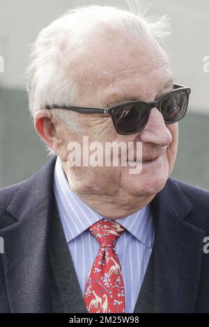King Albert II of Belgium wears sunglasses during a visit to car ...