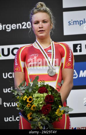 Danish Emma Cecilie Norsgaard Jorgensen crosses the finish line of the ...